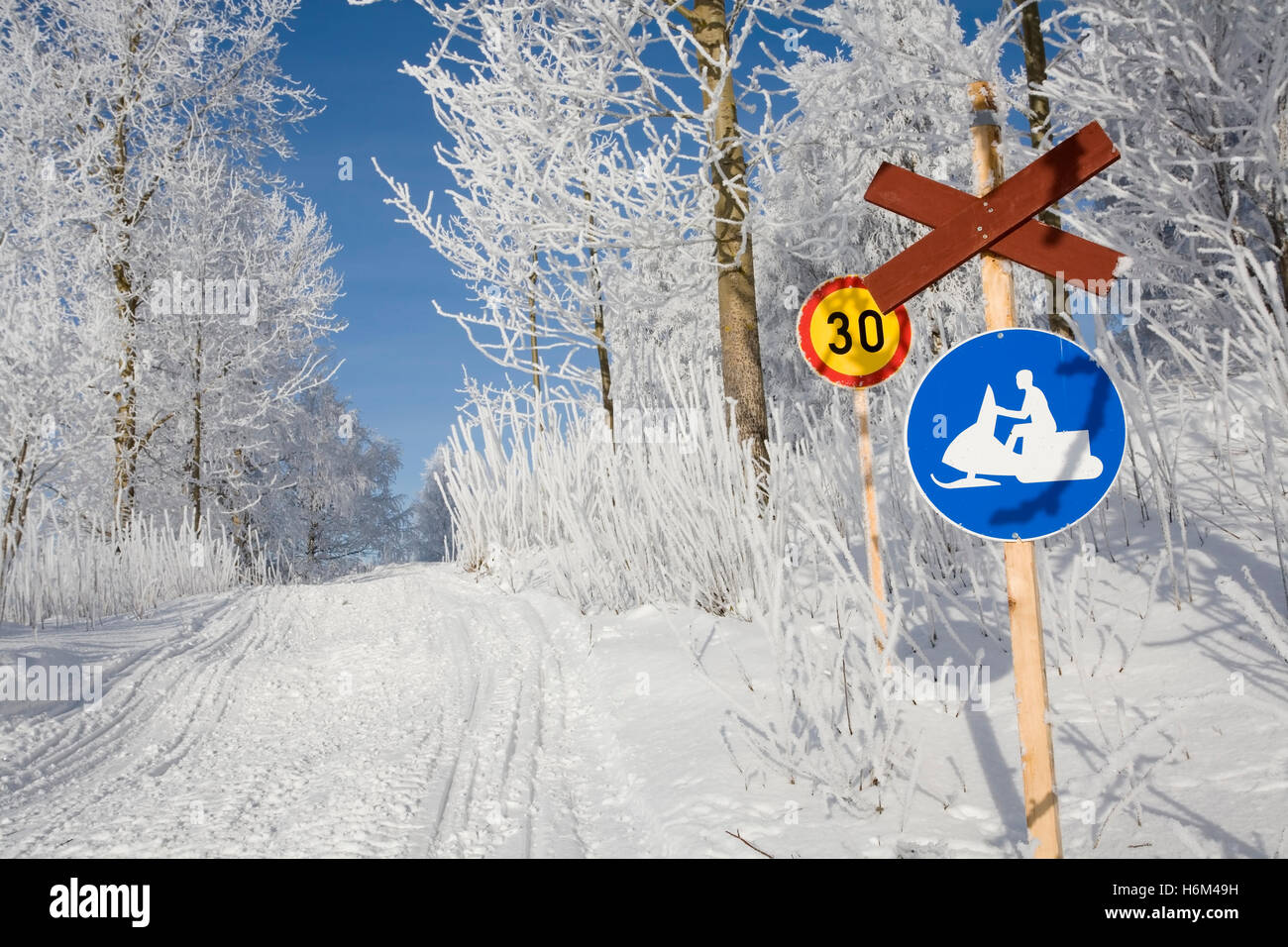 Snowmobile track with traffic signs hi-res stock photography and images ...