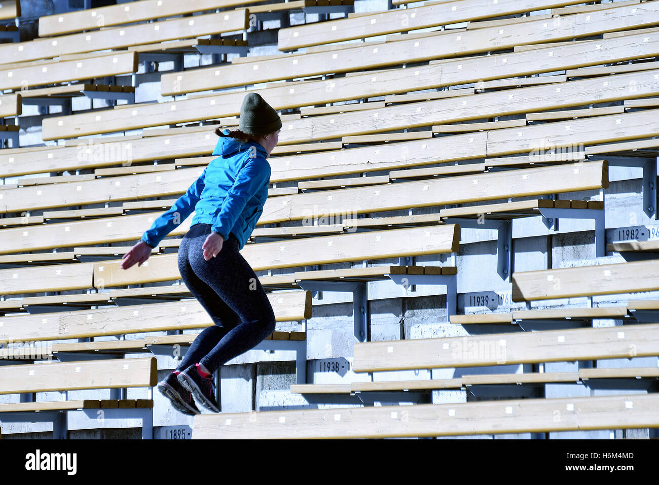 Jumping in stairs. Woman training on stairs Stock Photo - Alamy