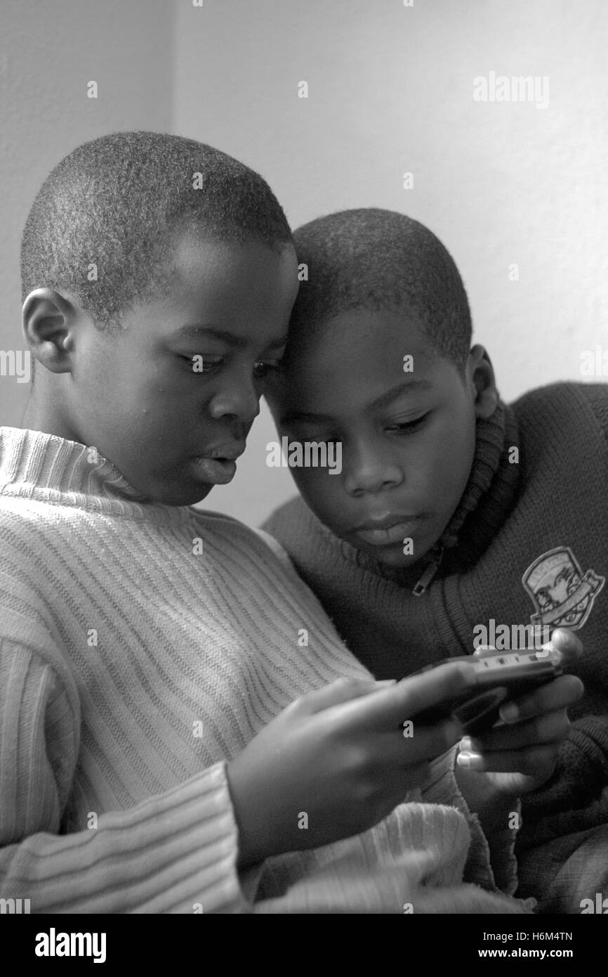 Children played hi-res stock photography and images - Alamy