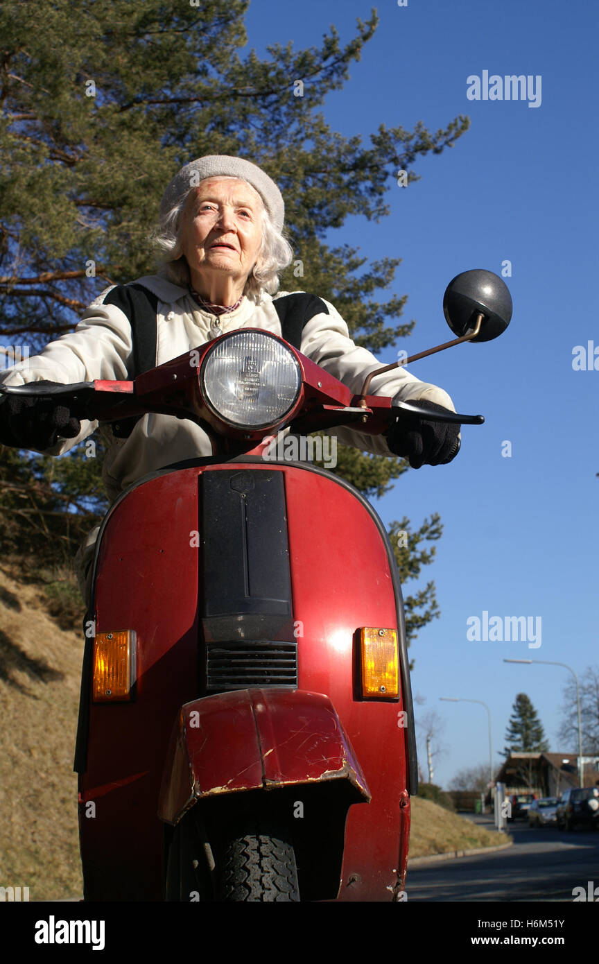 Elderly woman motorbike hi-res stock photography and images - Alamy
