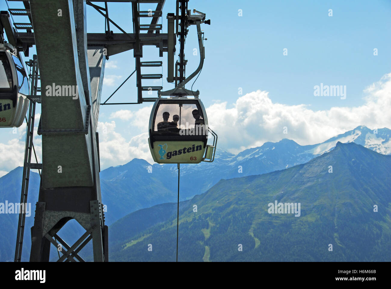 Alps alp gondola blue tree hi-res stock photography and images - Alamy