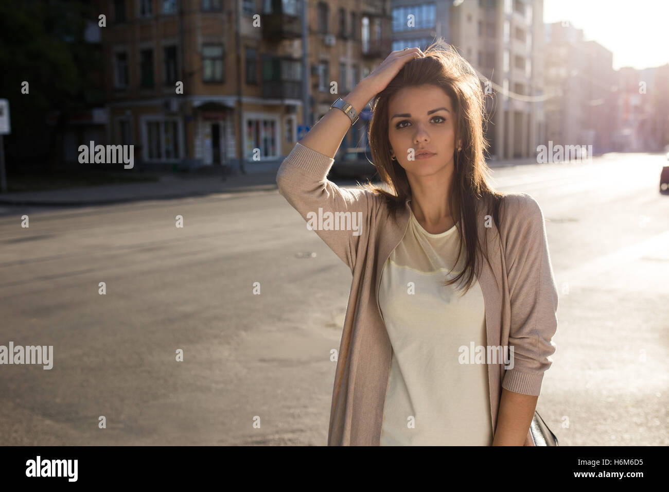 Portrait of beauty woman walking on the street Stock Photo - Alamy