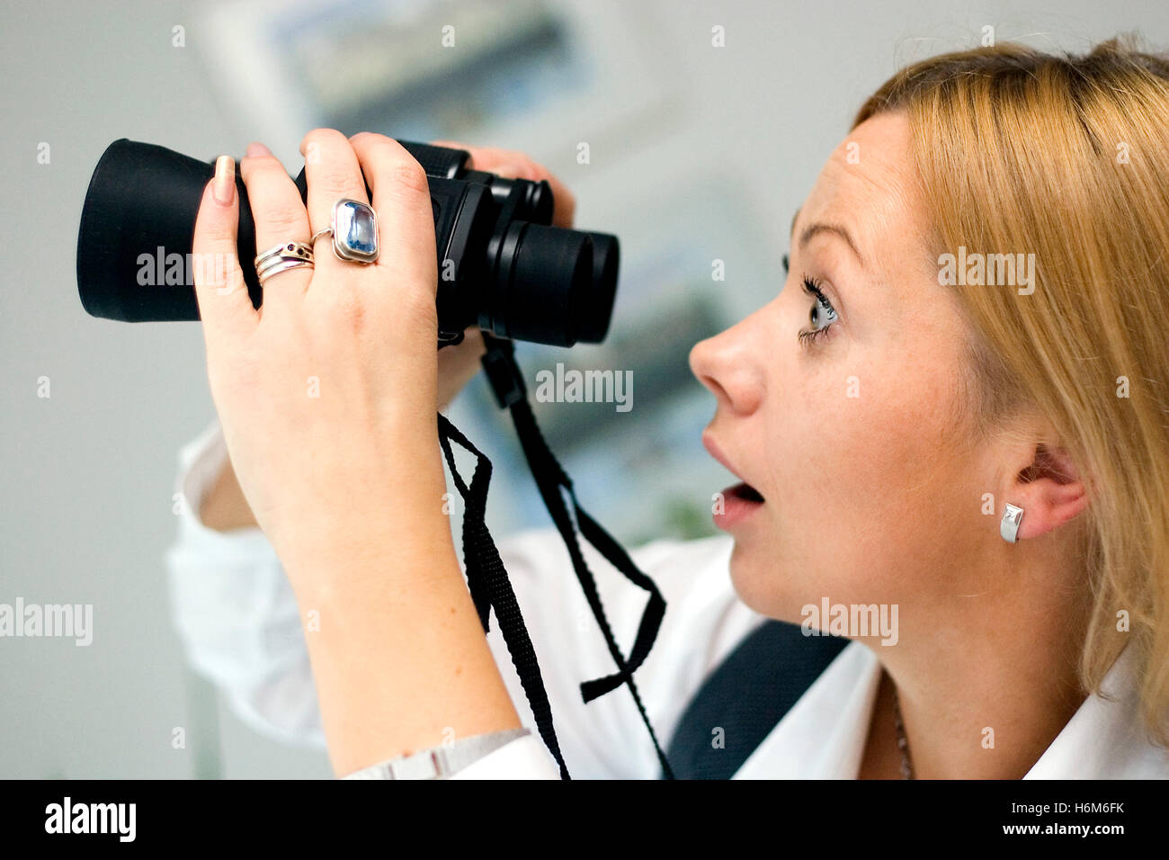 woman with binoculars Stock Photo - Alamy