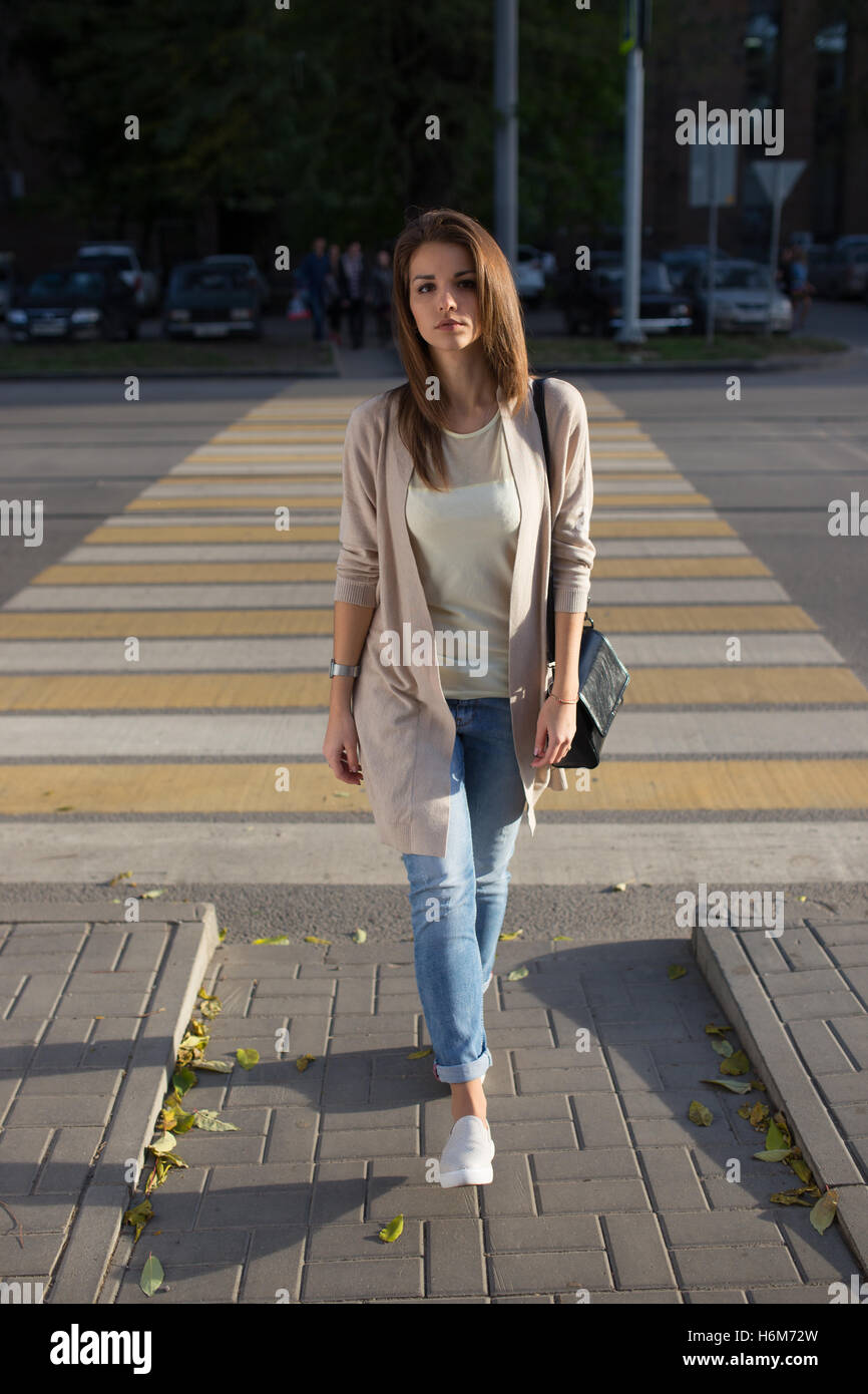 Portrait of beauty woman walking on the street Stock Photo - Alamy