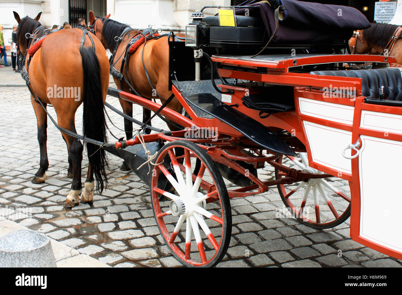 Horse-driven carriage at Hofburg palace, Vienna, Austria Stock Photo ...
