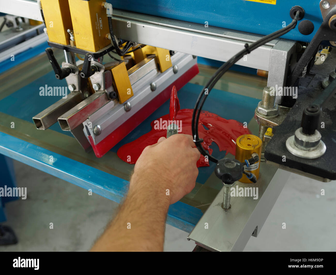 M&R Screen Printing press detail Stock Photo - Alamy