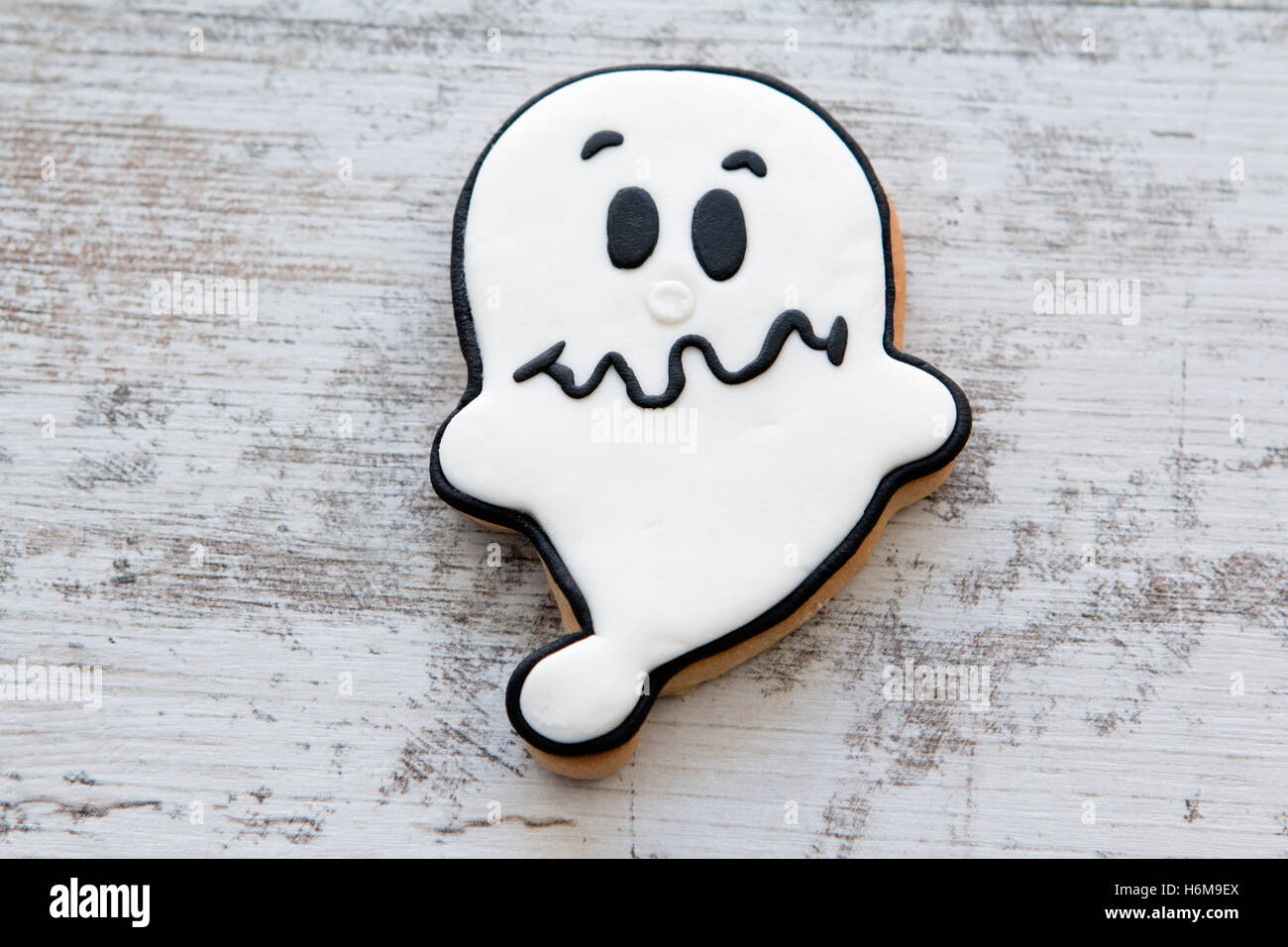 Halloween cookie with ghost shape. Sweet tradition Stock Photo - Alamy