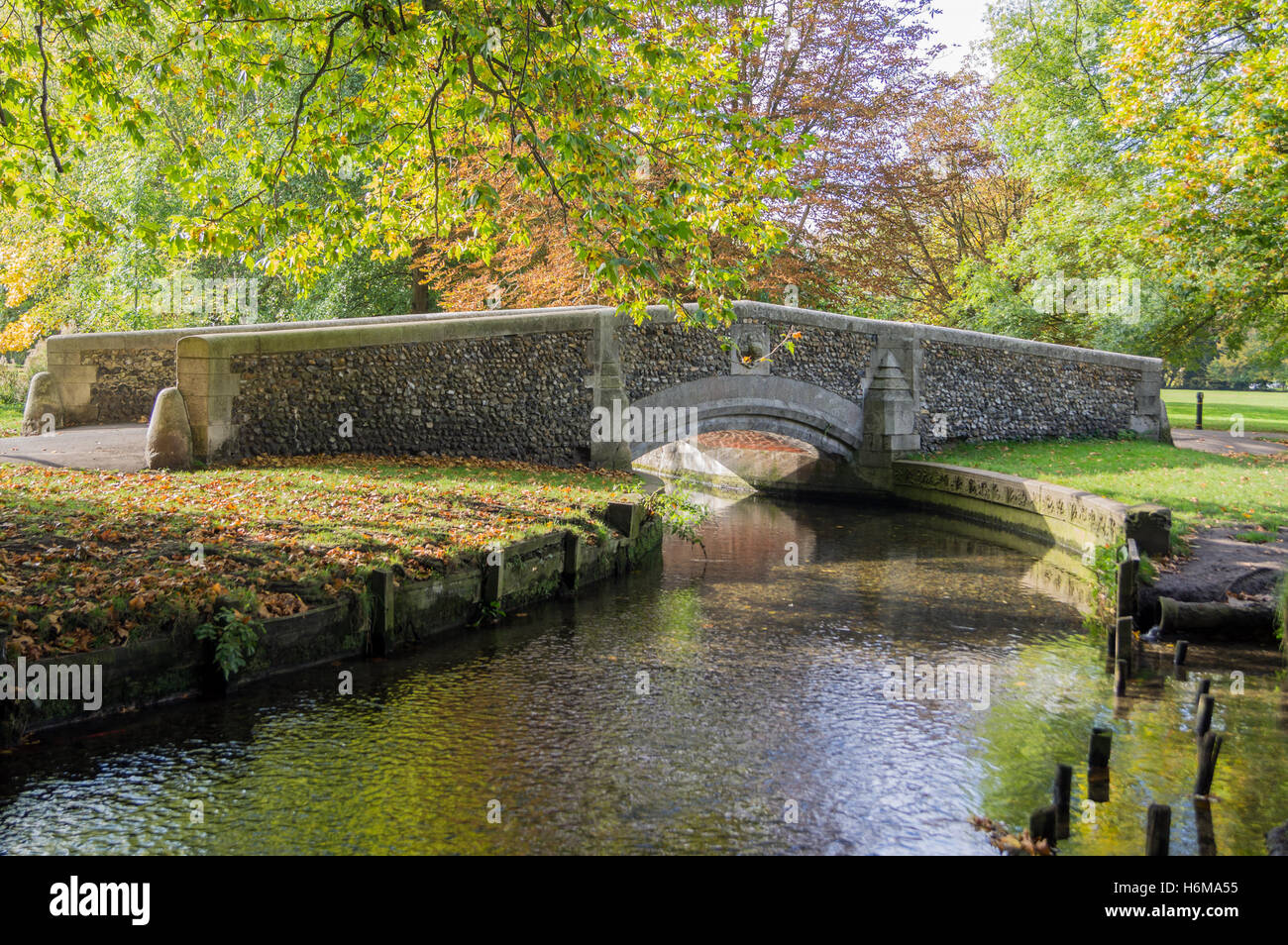 Victorian stone and flint clunch bridge over the river Wandle, Wandle ...