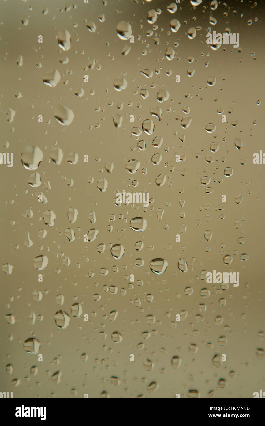Glass with drops of rain water close up Stock Photo - Alamy