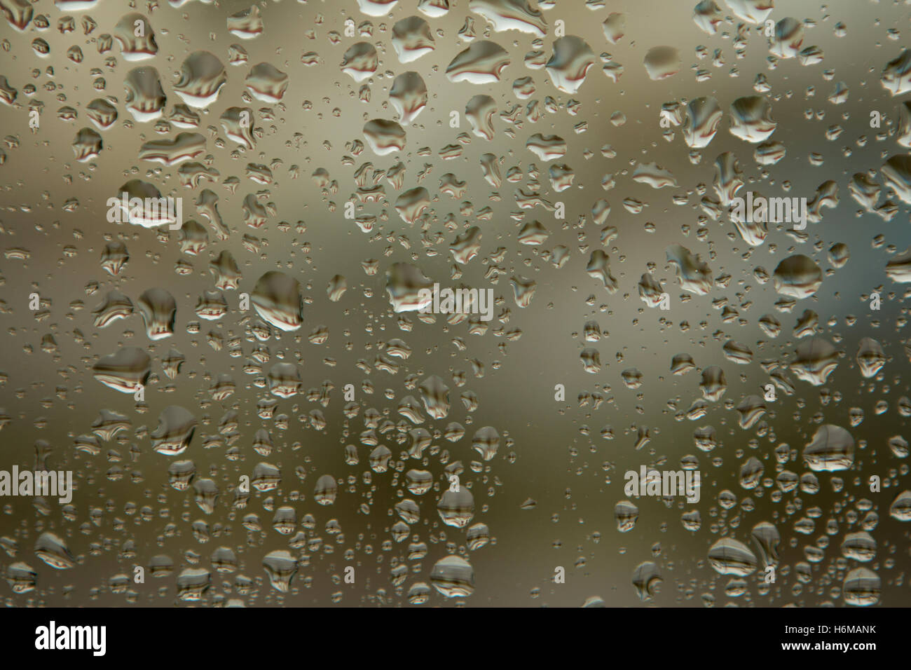 Glass with drops of rain water close up Stock Photo - Alamy