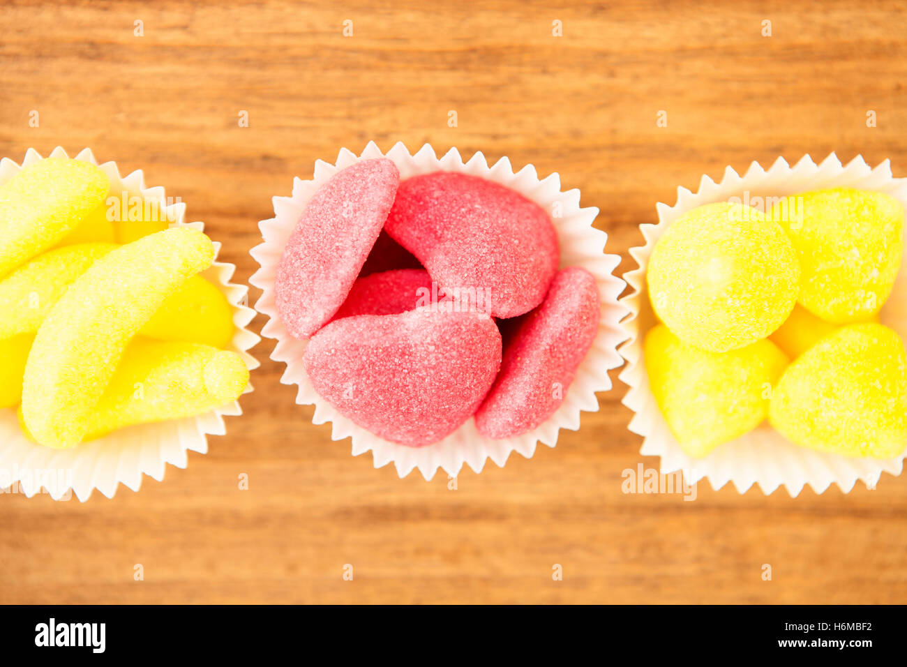 Types of candies placed in small bowls by type and color Stock Photo ...