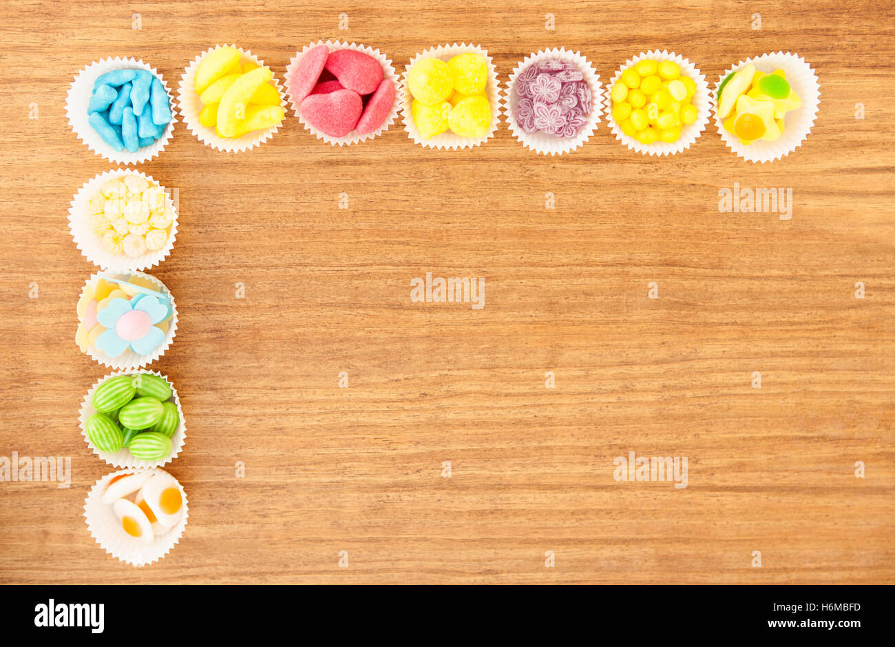 Many types of candies placed in small bowls by type and color Stock ...