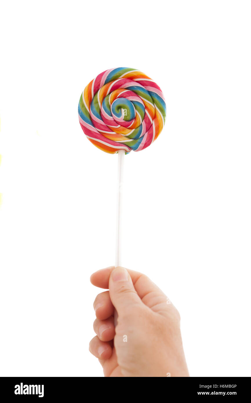 Nice round lollipop with many colors in a spiral Stock Photo - Alamy