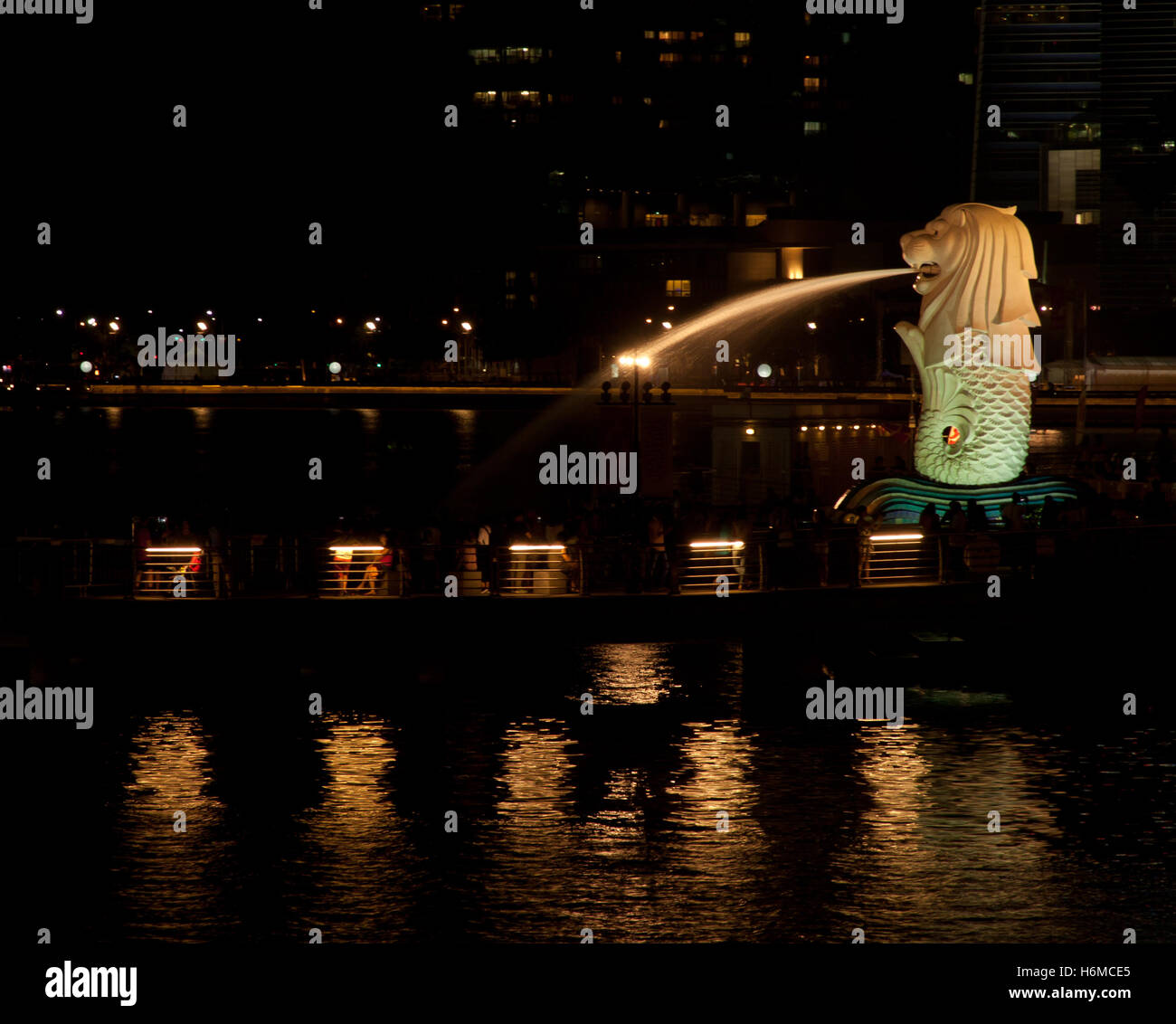 The Merlion fountain at night in Singapore Stock Photo - Alamy