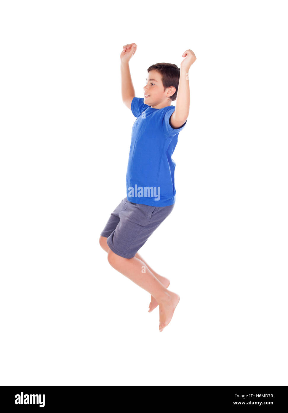 Happy child jumping isolated on a white background Stock Photo - Alamy
