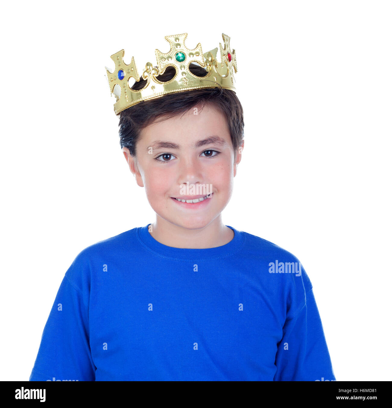 Happy child with golden crown on the head isolated on a white ...