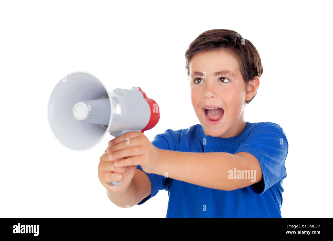 Funny boy shouting through a megaphone isolated on a white background ...