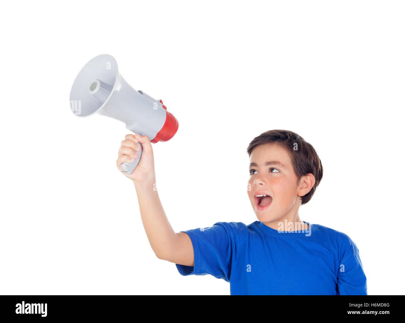Funny boy shouting through a megaphone isolated on a white background ...