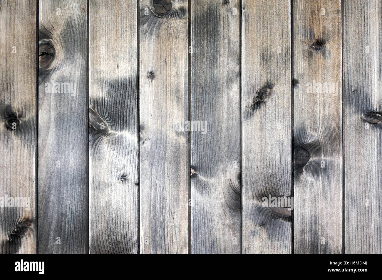 Closeup of a rustic wall built with natural wood planks Stock Photo - Alamy