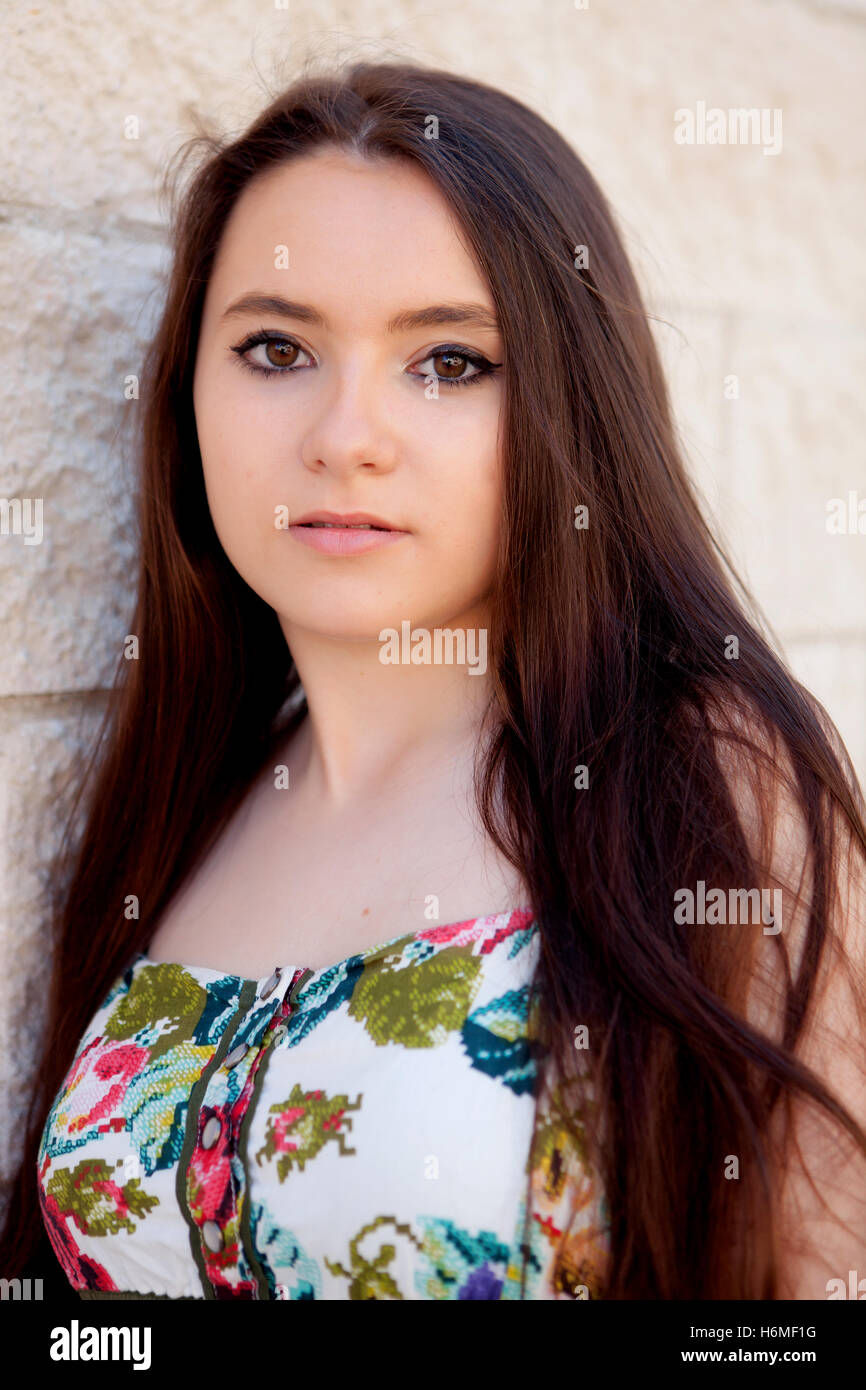 Spanish Brunette Girl With Long Hair On The Street Stock Photo Alamy