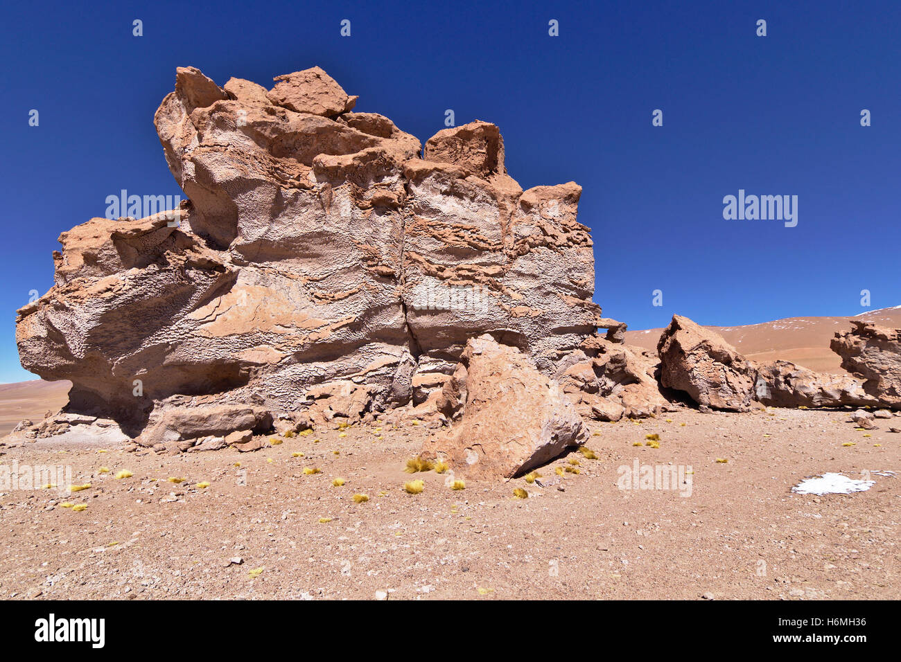 Erosion sculpted red rocks in the desert under a beautiful clean sky ...