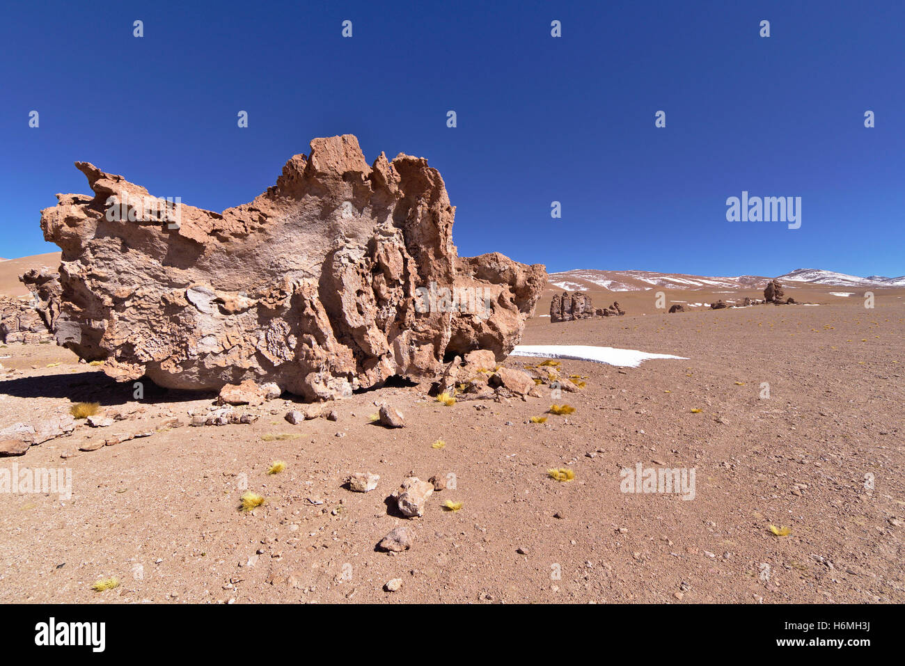 Erosion sculpted red rocks in the desert under a beautiful clean sky ...