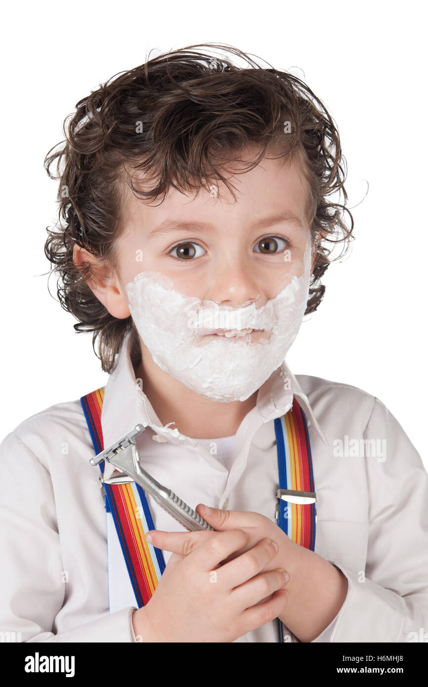 Six year old boy shaving isolated on white background Stock Photo - Alamy
