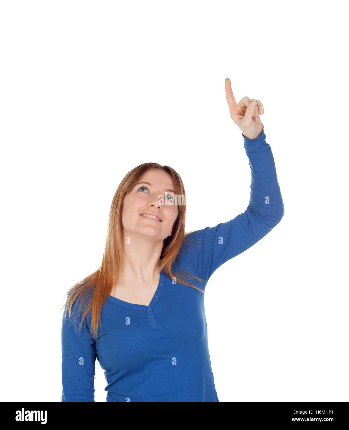 Attractive young woman indicating something isolated on a white ...