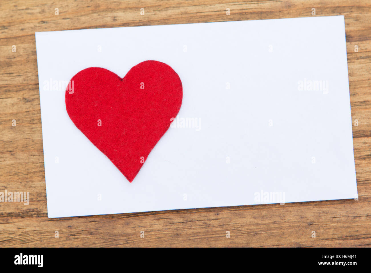Blank sticky note with a red heart Stock Photo - Alamy