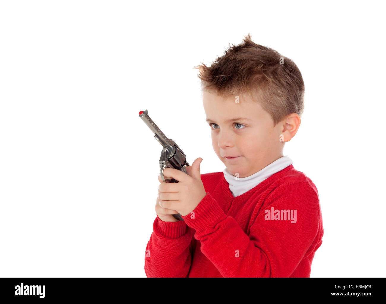 Small boy playing with a gun isolated on white background Stock Photo ...