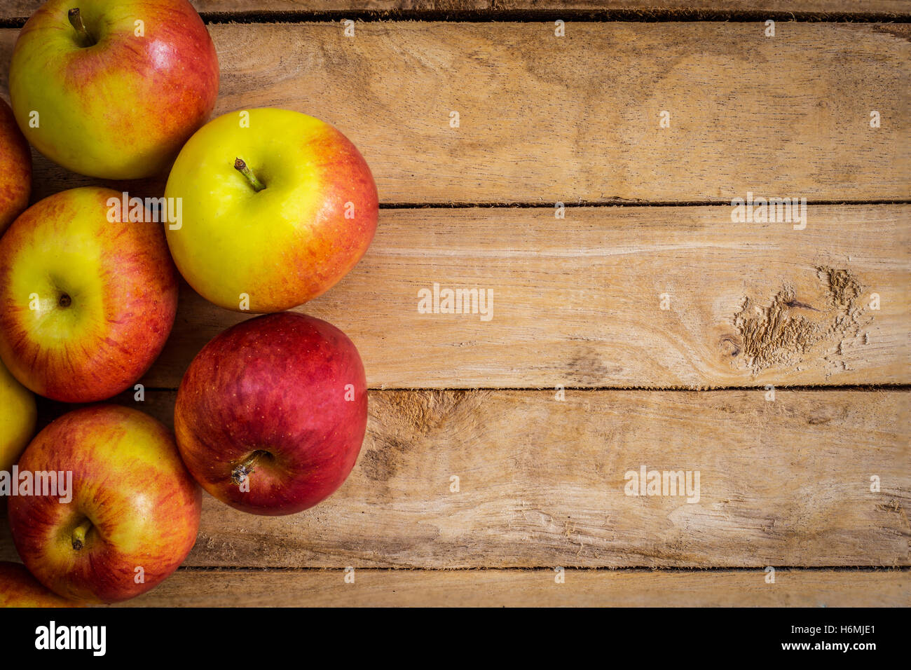 red apple on wood background texture with space for text Stock Photo ...