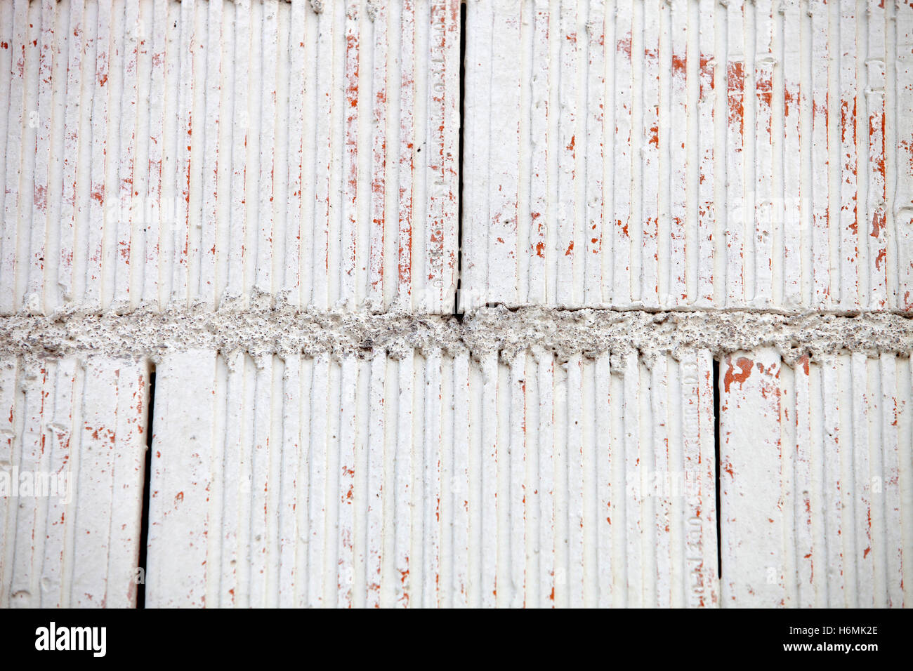 White wall of cement blocks for background Stock Photo - Alamy
