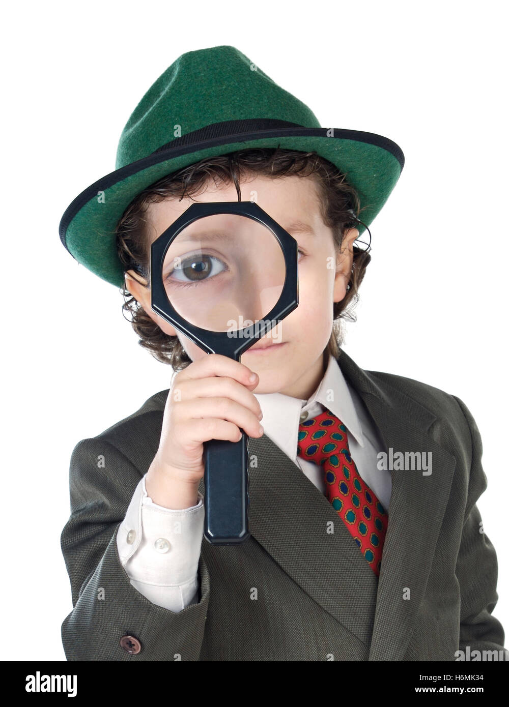 Little detective with magnifying glass to search for the mystery Stock ...