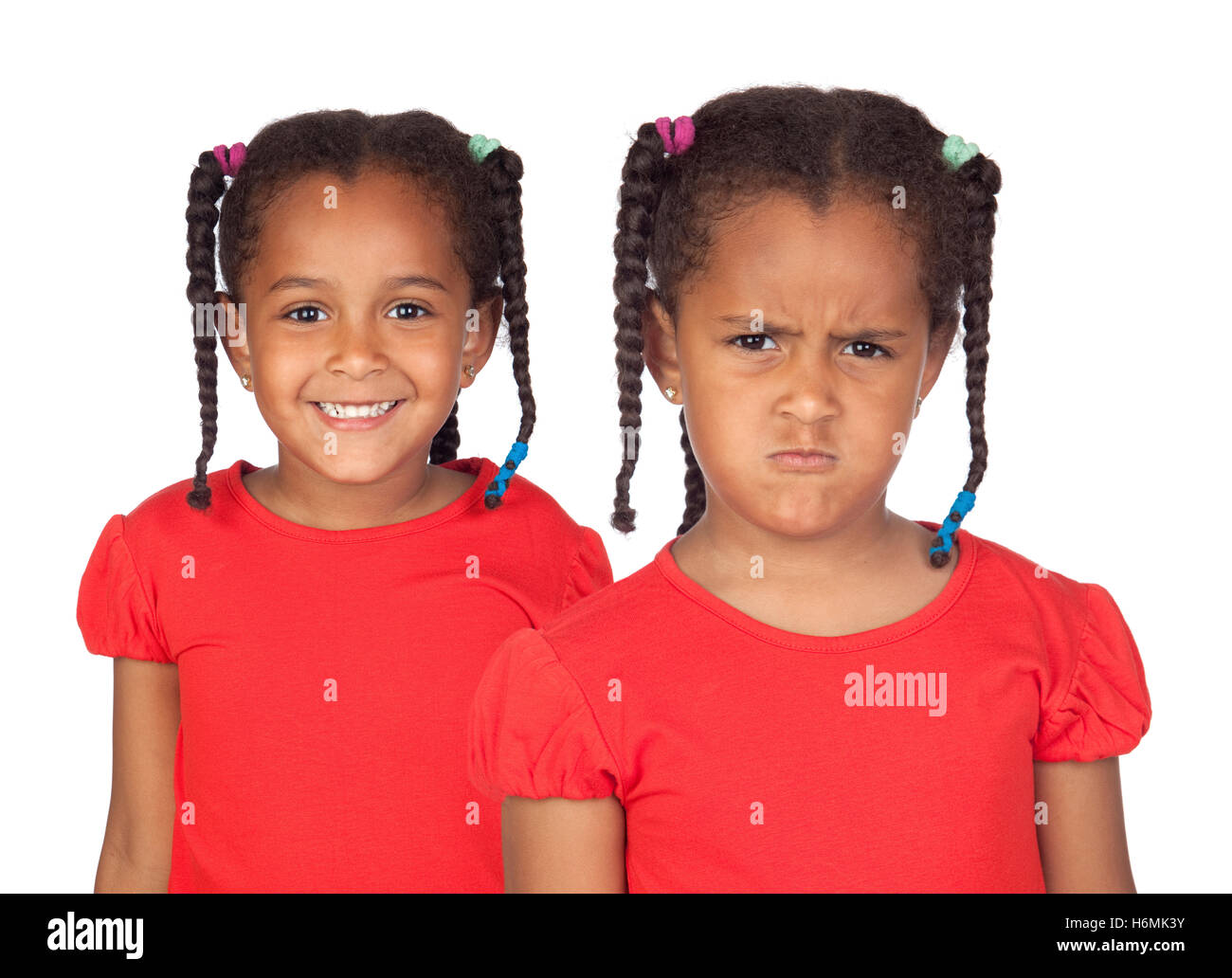 Afroamerican twins with braids. One happy and the other very angry ...