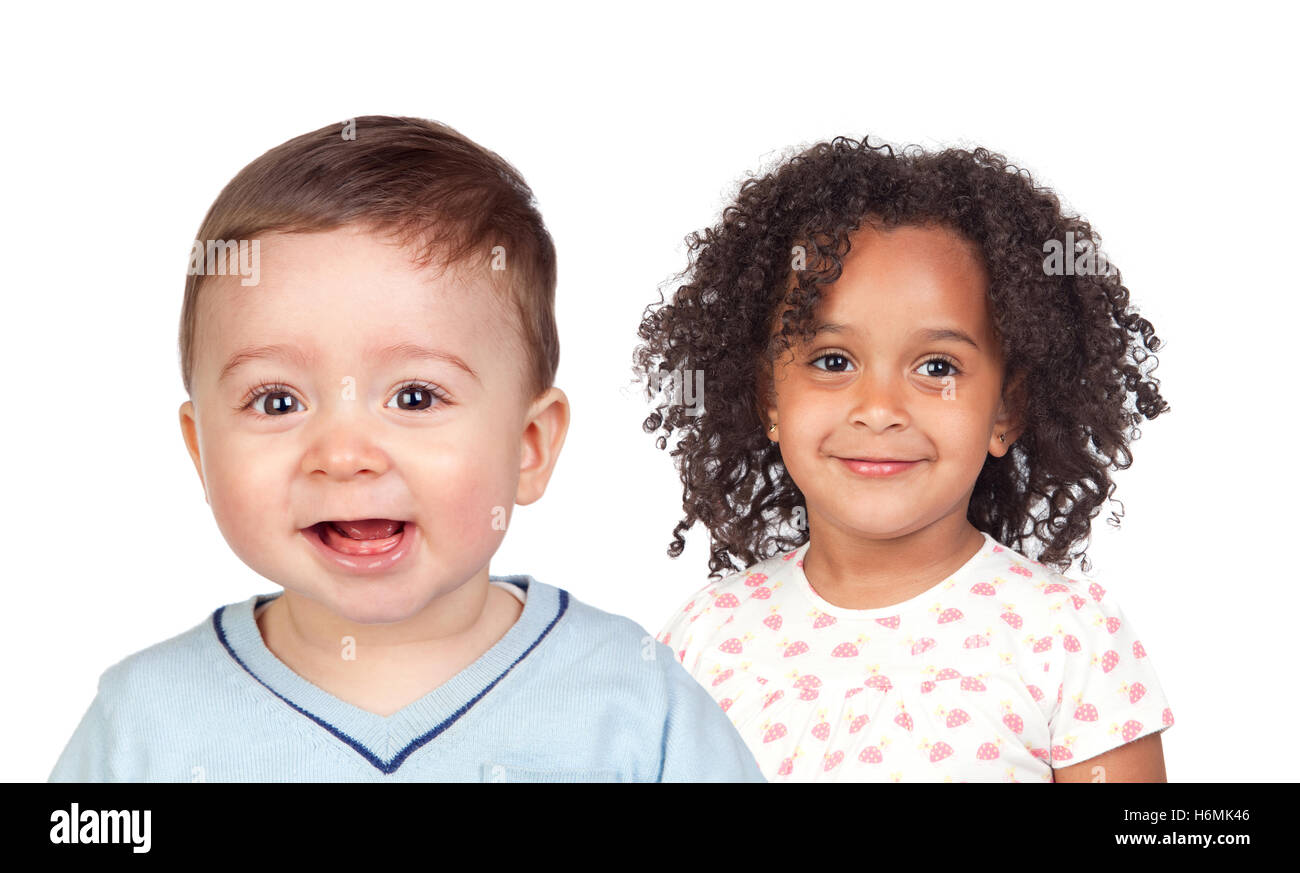 Two beautiful children looking at camera isolated on a white background ...