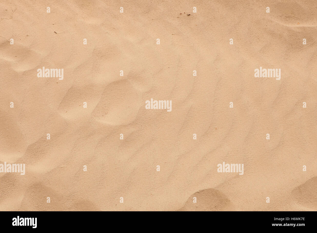 Sand beach with waves formed by the air Stock Photo - Alamy