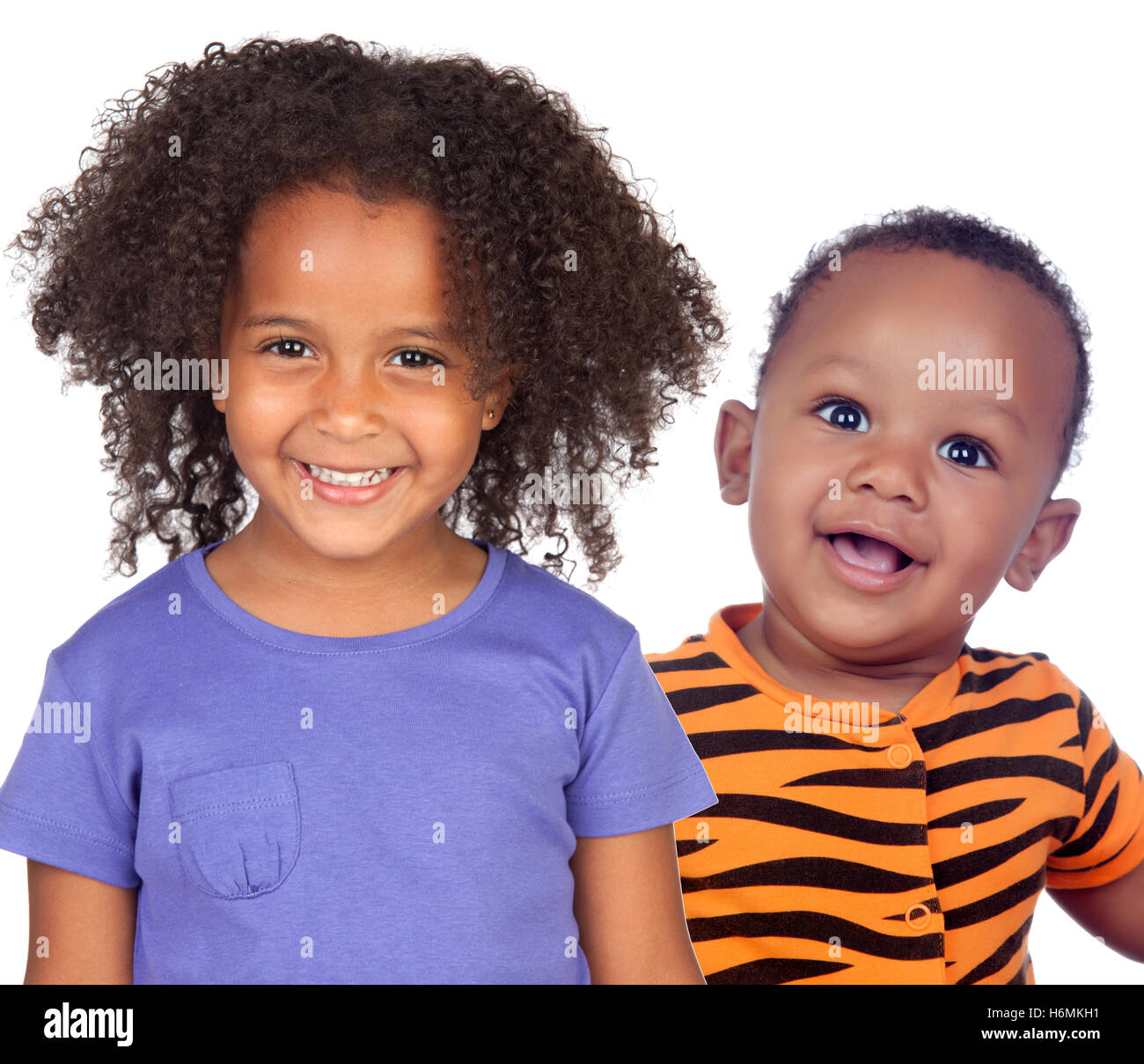 Two adorable african children smiling isolated on a white background ...