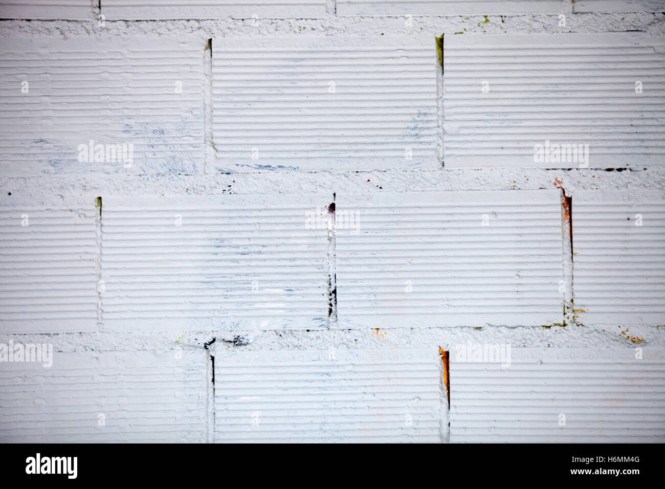 White wall of cement blocks for background Stock Photo - Alamy