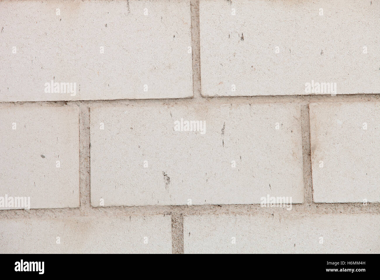 White wall of cement blocks for background Stock Photo - Alamy