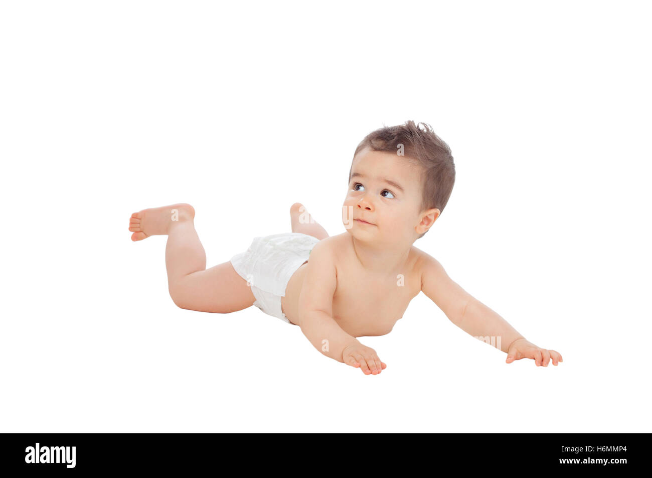 Cool little baby lying on the floor with a diaper isolated on a white ...