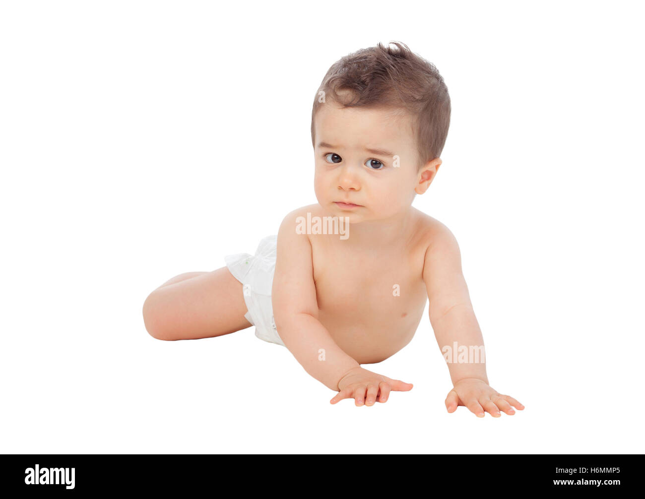 Cool little baby lying on the floor with a diaper isolated on a white ...