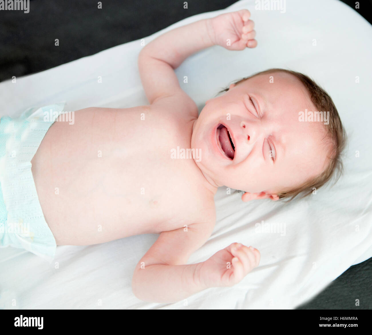 Crying inconsolably hi-res stock photography and images - Alamy
