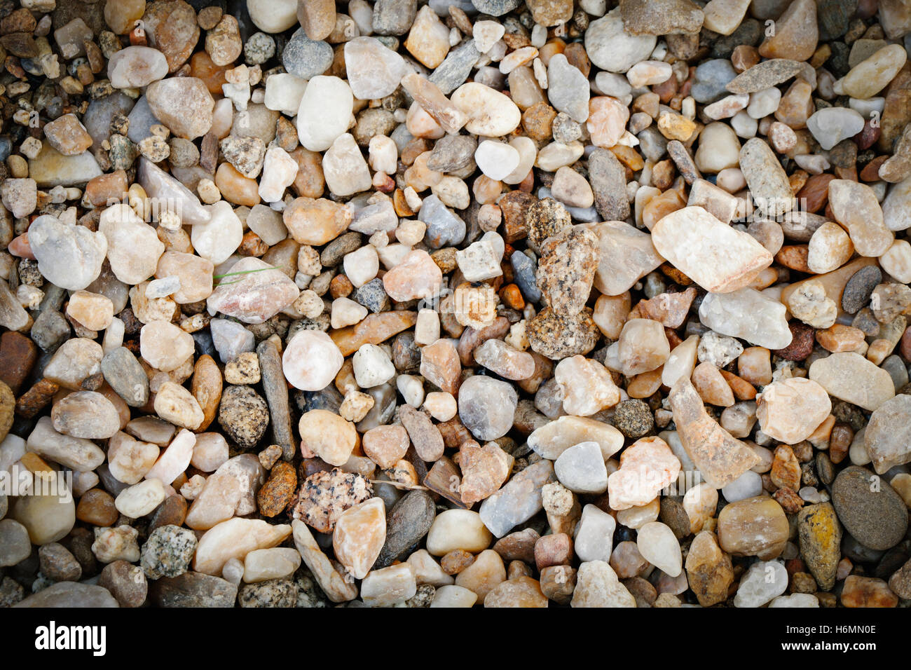 Wallpaper with small stones of the beach Stock Photo - Alamy