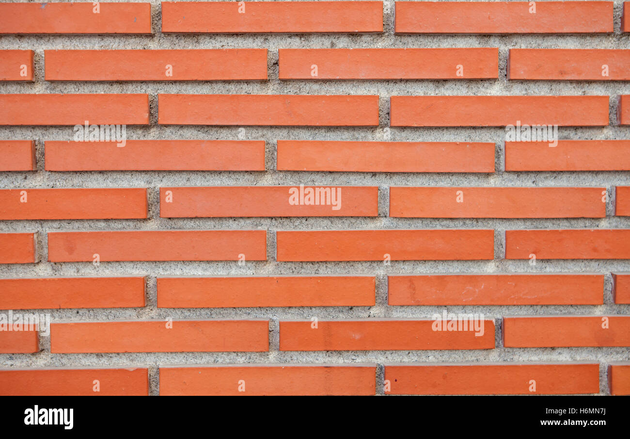 Red brick wall as exterior trim option Stock Photo - Alamy