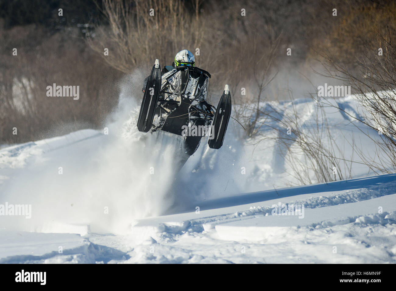 Snowmobile riding on snowy mountain hi-res stock photography and images ...