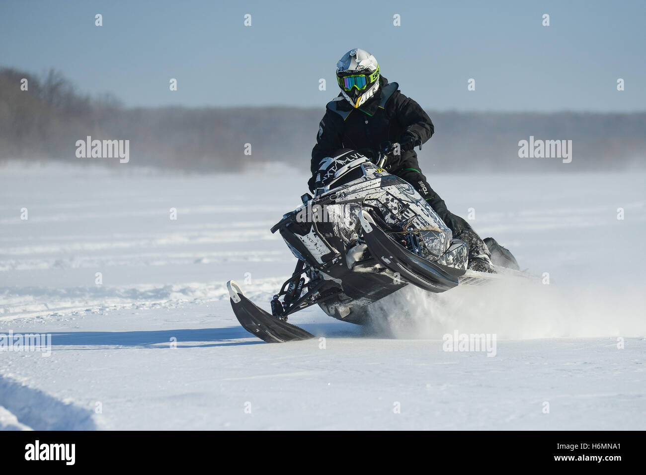 Snowmobile riding on snowy mountain hi-res stock photography and images ...