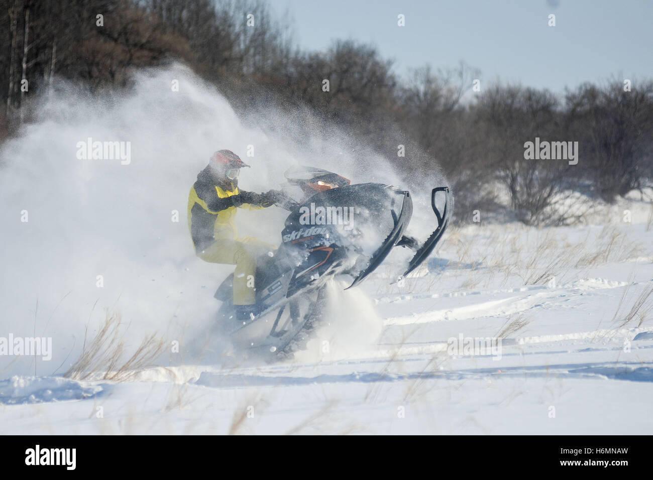 Snowmobile riding on snowy mountain hi-res stock photography and images ...