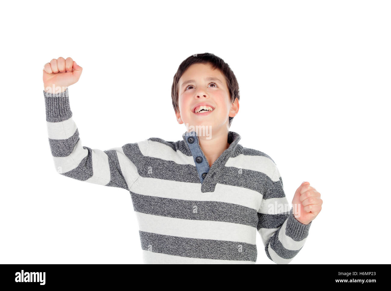 Winner boy raising their arms isolated on a white background Stock ...