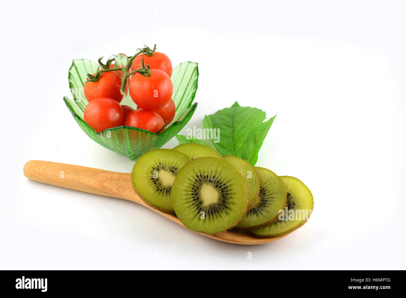 kiwi slice on white Stock Photo - Alamy