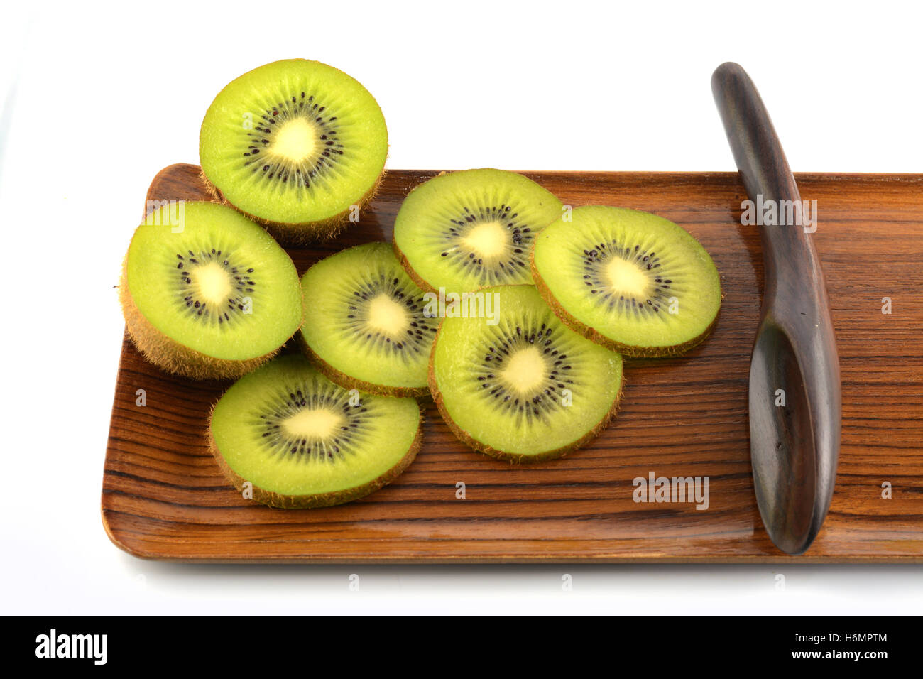 kiwi slice on white Stock Photo - Alamy